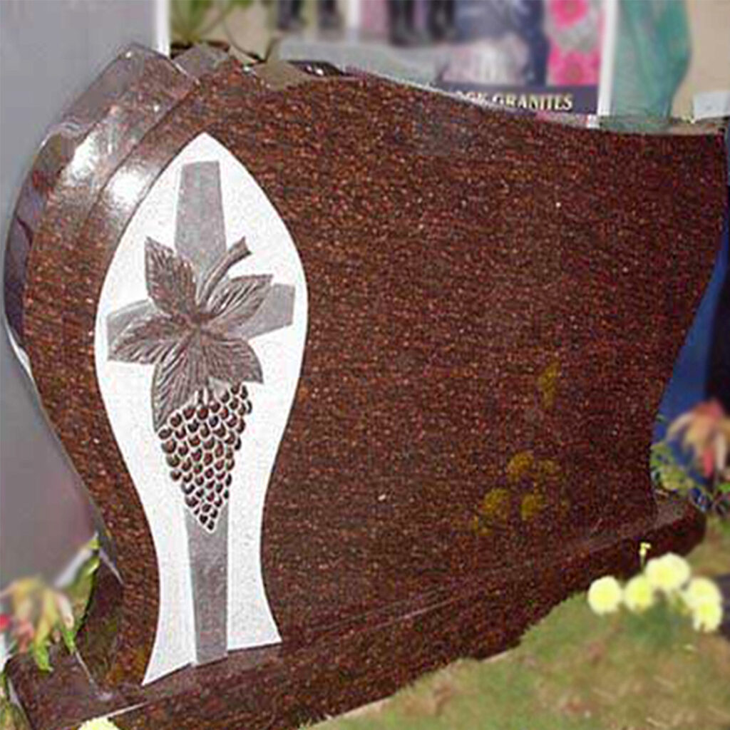 Cat’s Eye Granite Monument with Cross Engraving on the Top